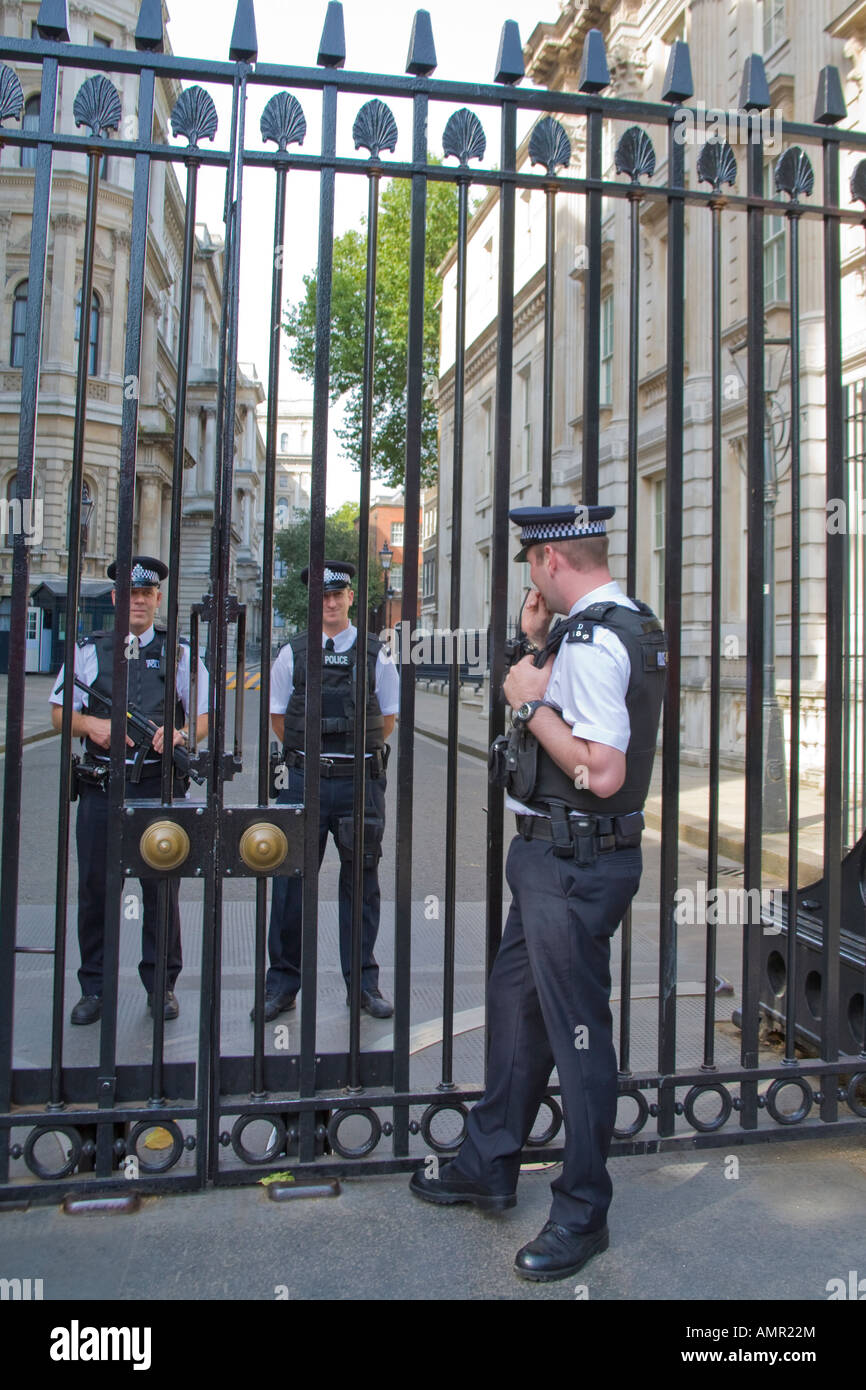 Armed police inside the gates of Downing Street London England Stock ...