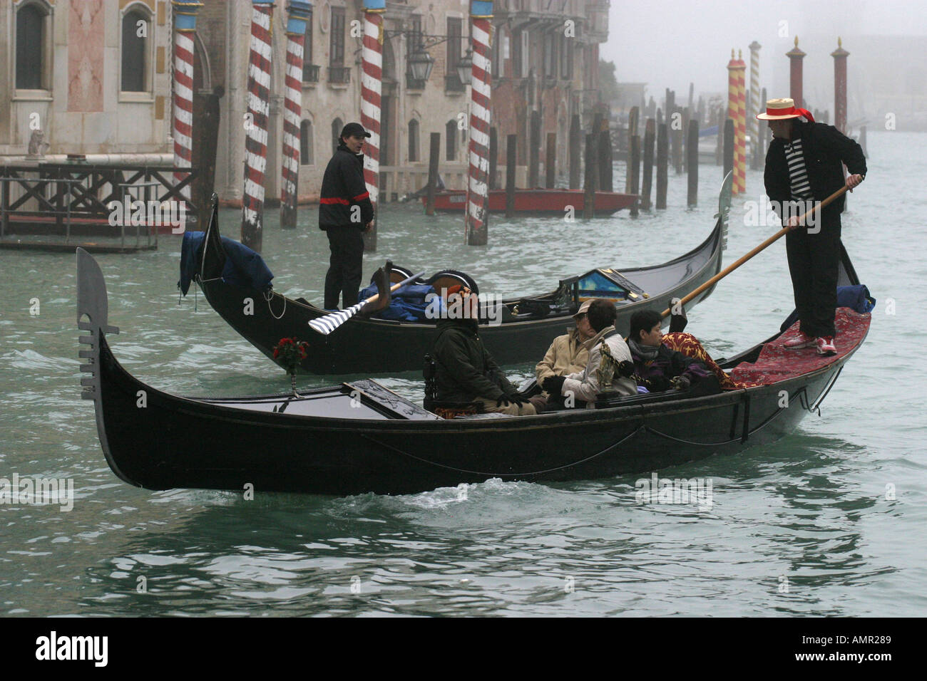 Gondoliers on the Grand Canal, Venice Stock Photo - Alamy
