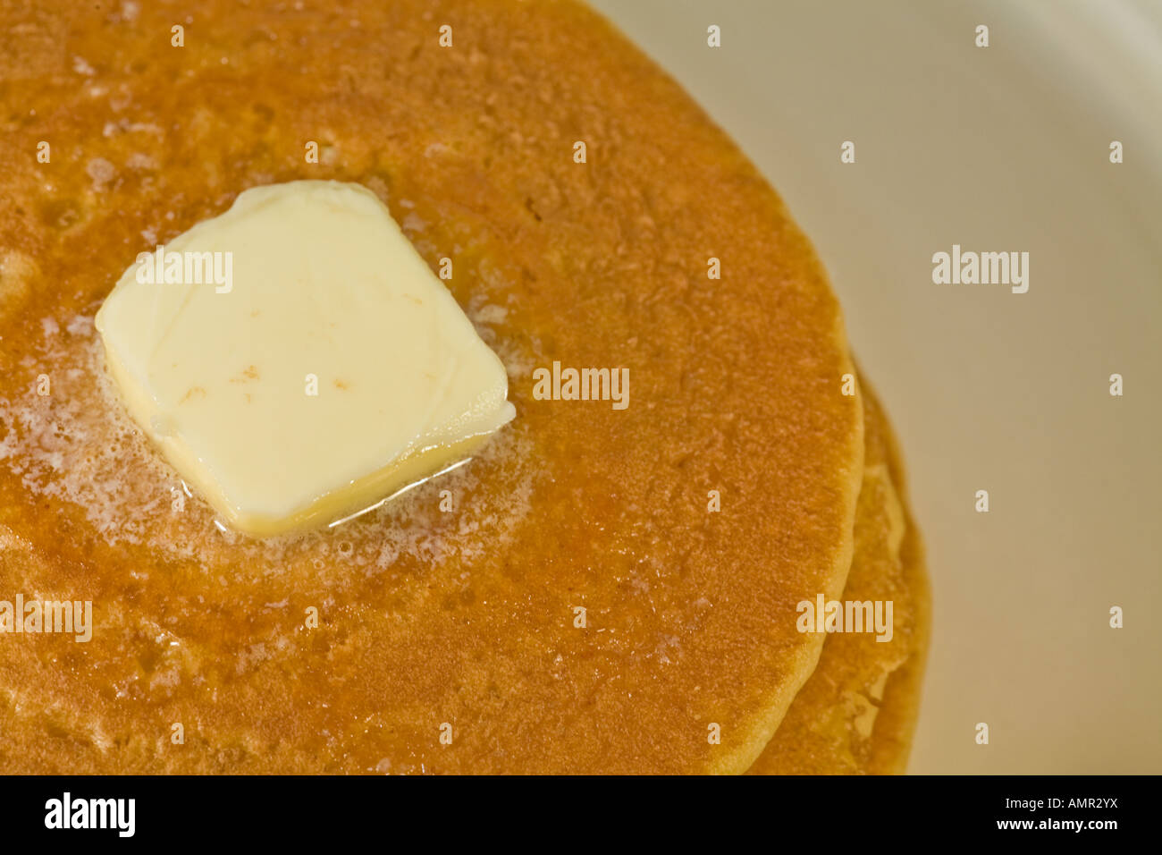 Pancakes with a pat of butter Stock Photo - Alamy