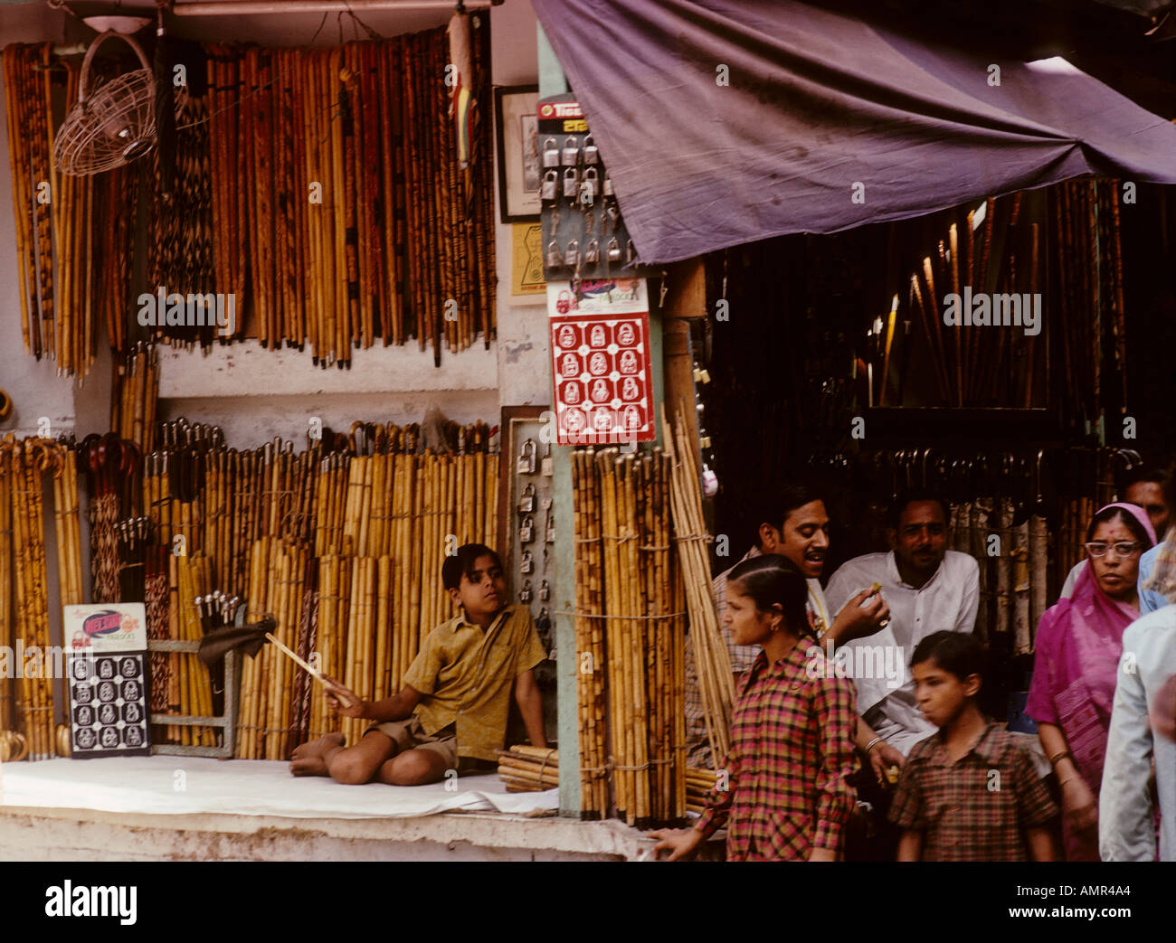 Indian bazaar cane shop stall child labour Stock Photo - Alamy