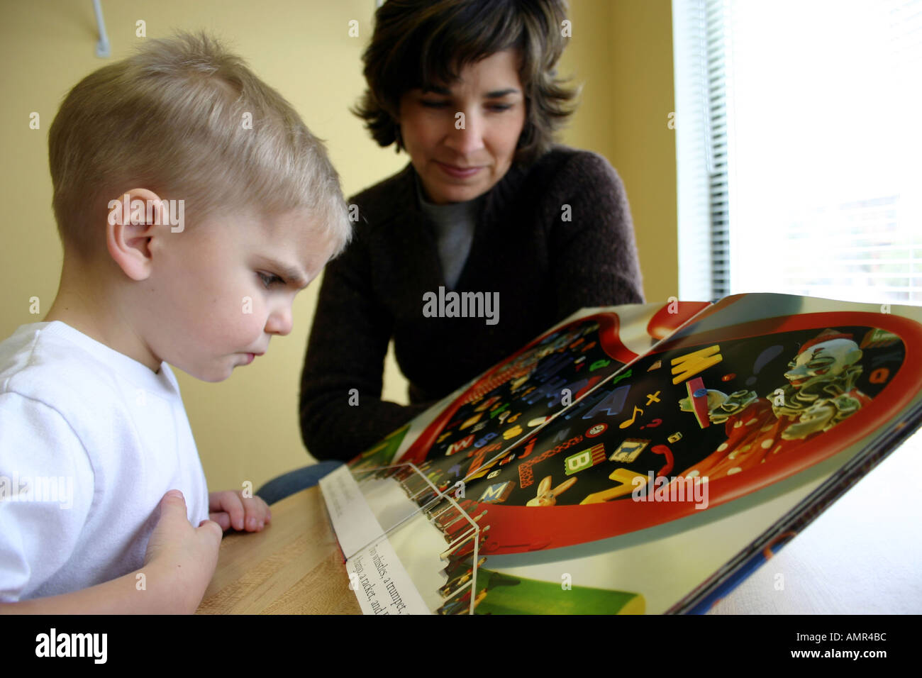 therapist works with child on visual spatial perception skills with ...