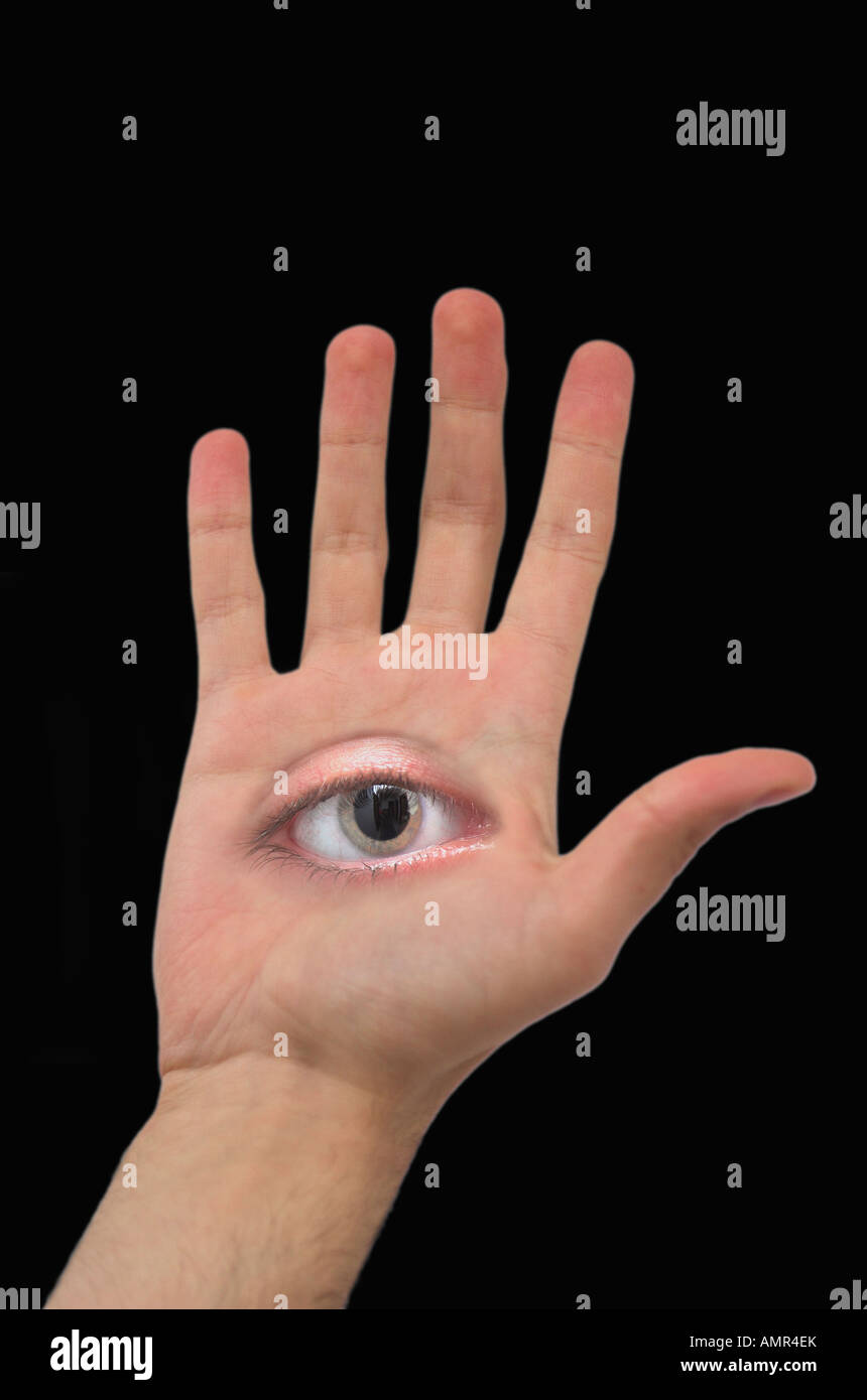Eye in persons hand digital composite Stock Photo - Alamy
