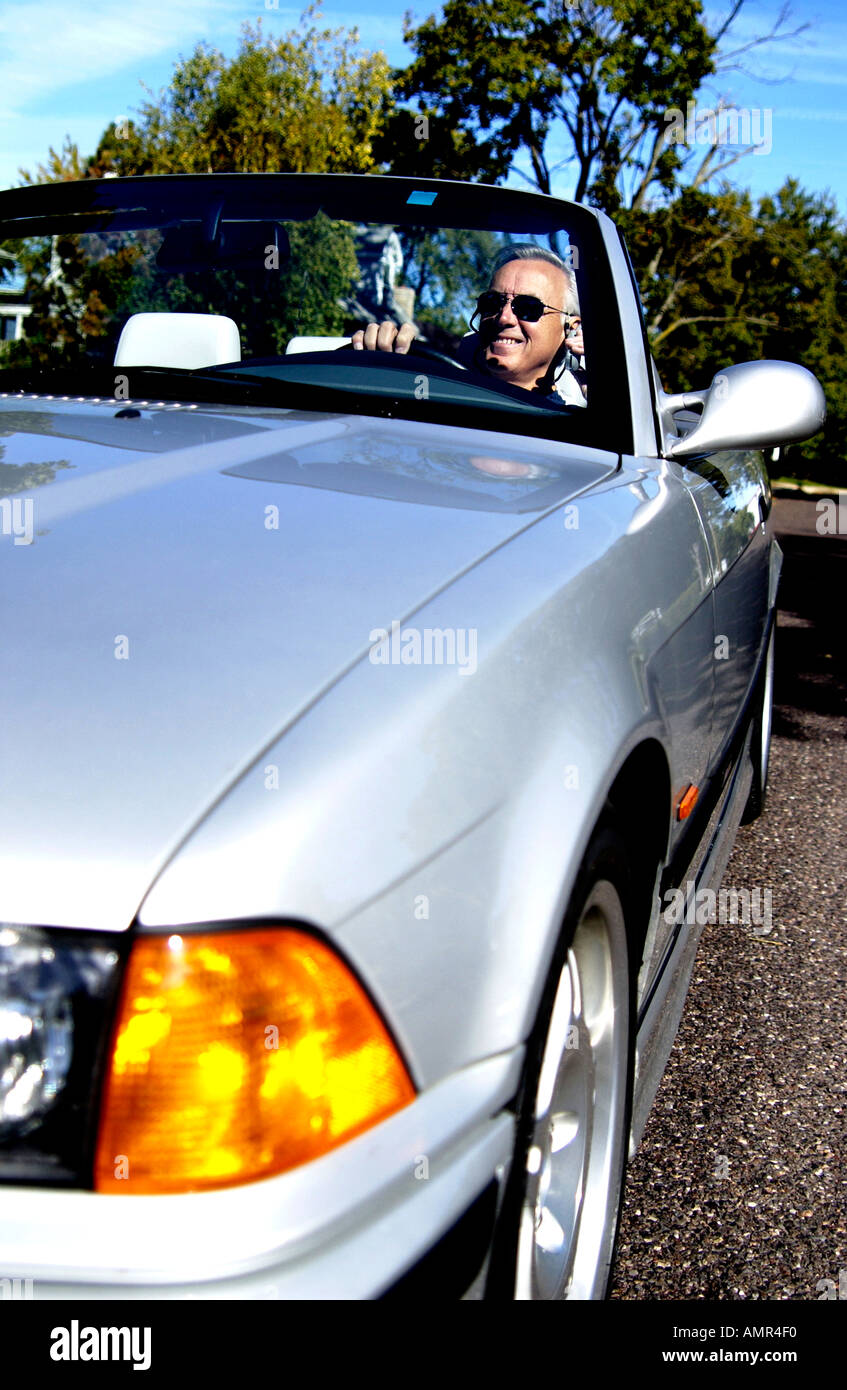 Man in convertible Stock Photo - Alamy
