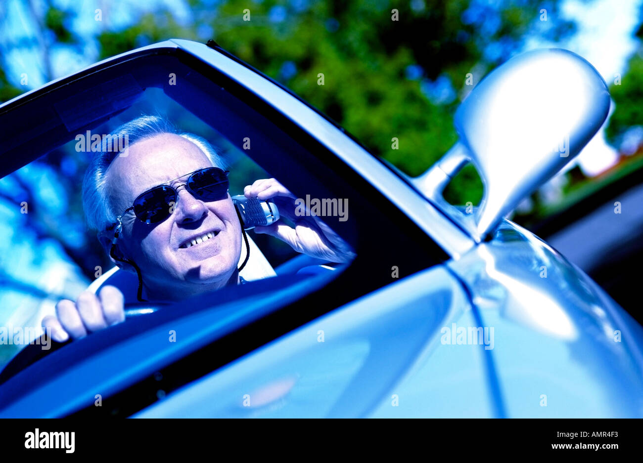 Man in convertible Stock Photo - Alamy