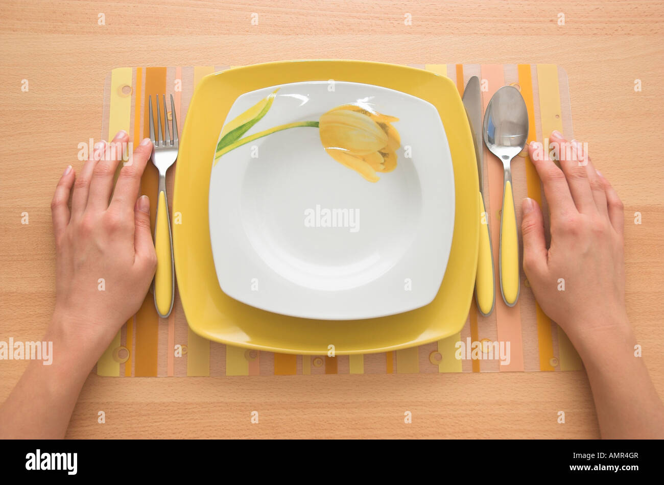 Woman sitting at table view from above Stock Photo - Alamy
