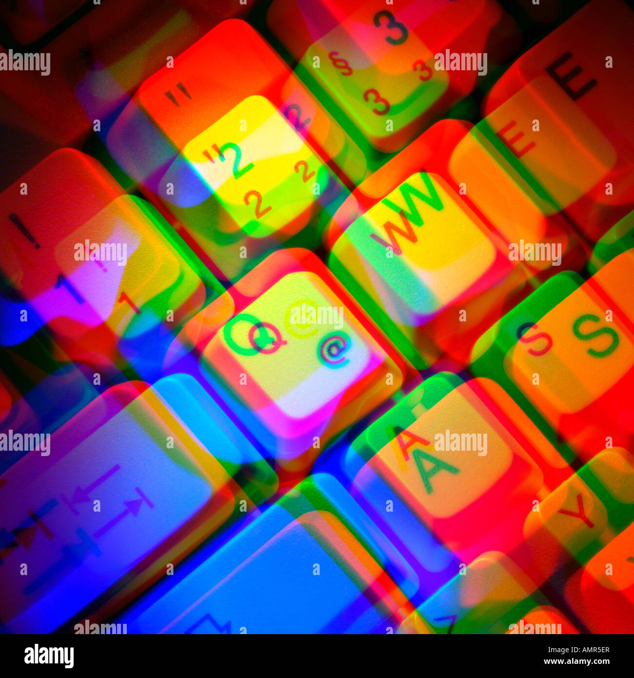 Close-up of a computer keyboard in colored light Stock Photo - Alamy