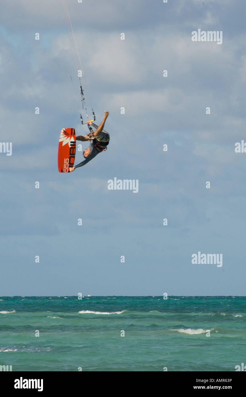 Wet suit jump beach hi-res stock photography and images - Alamy