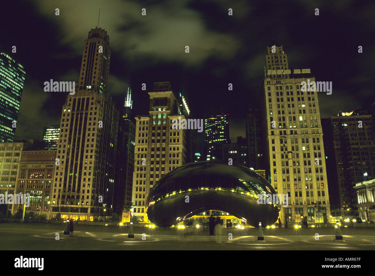 Chicago Cloud Gate Sculpture in Millennium Park with the Chicago ...