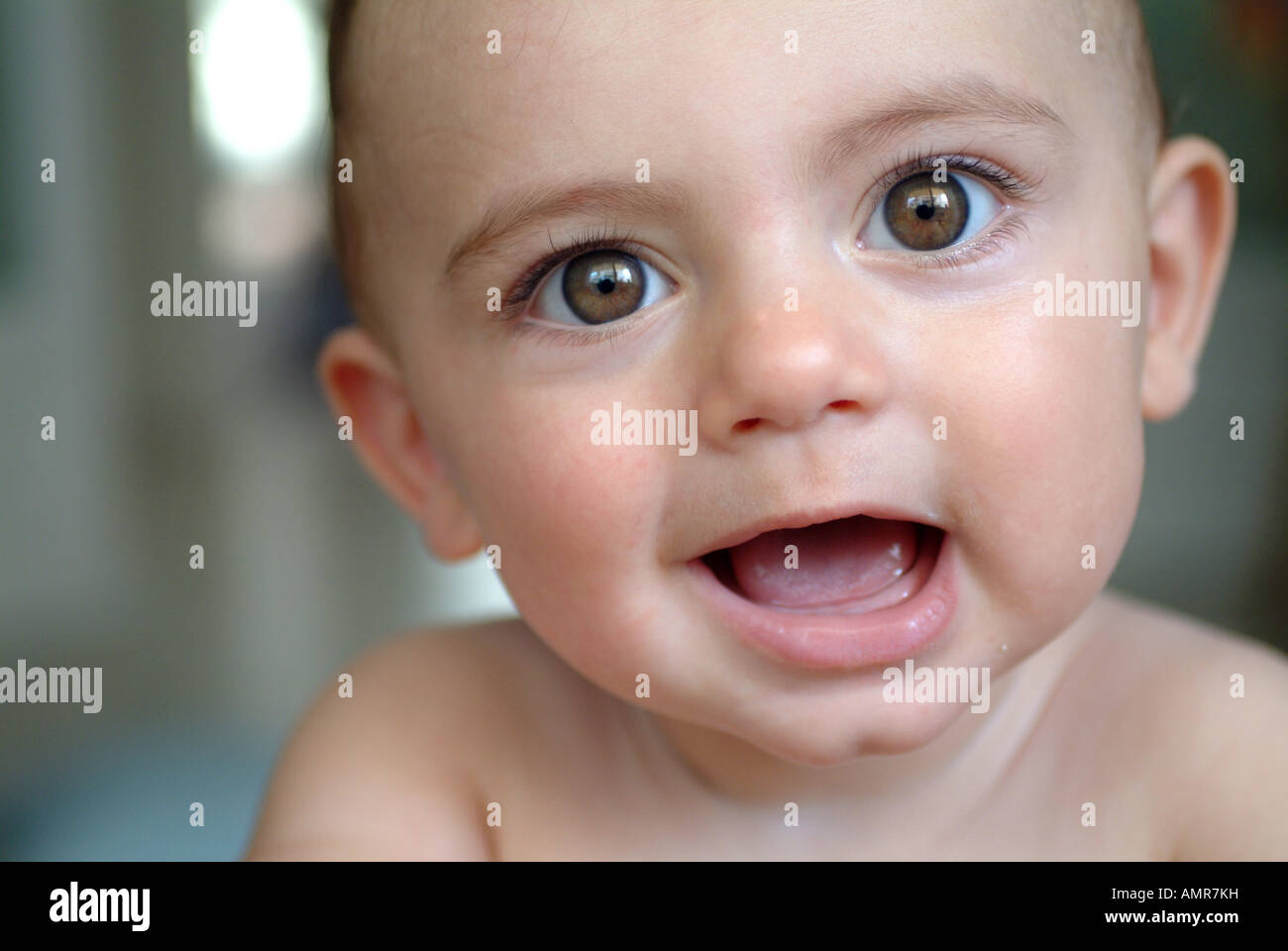 Closeup of cute happy baby smiling Stock Photo - Alamy