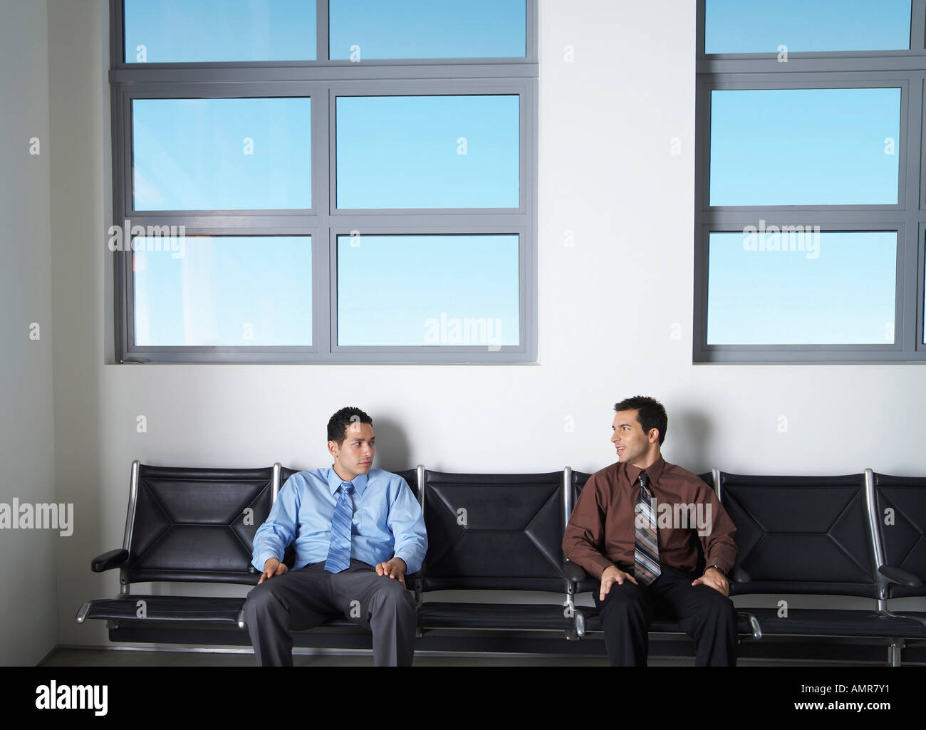 Old man sitting down in waiting room hi-res stock photography and ...