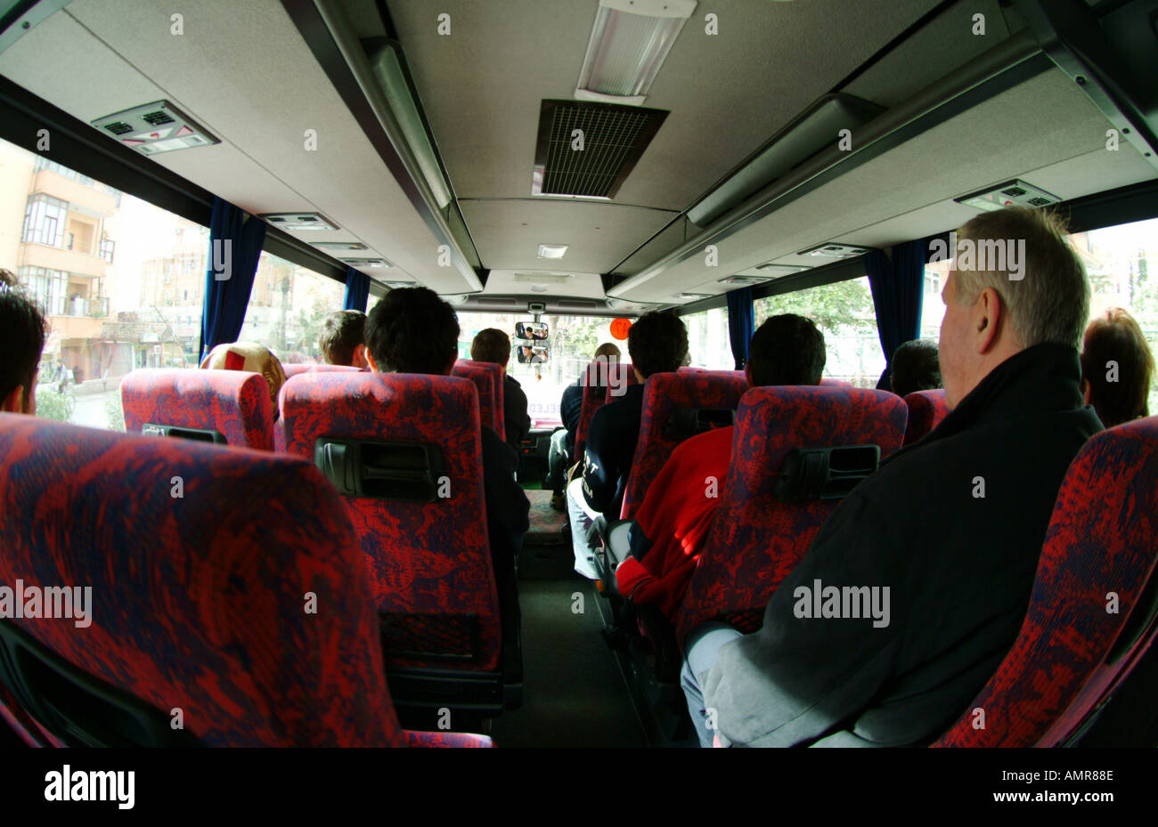 coach interior passengers Stock Photo - Alamy