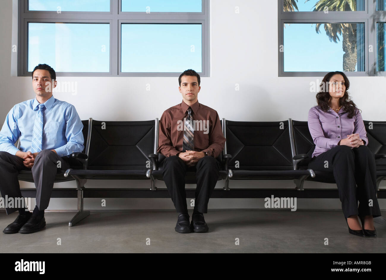 Businesspeople interviewing woman work in hi-res stock photography and ...