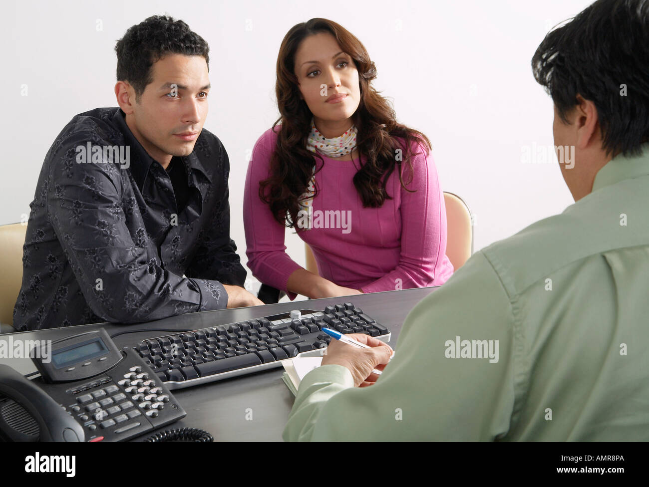 Couple Meeting with Advisor Stock Photo - Alamy
