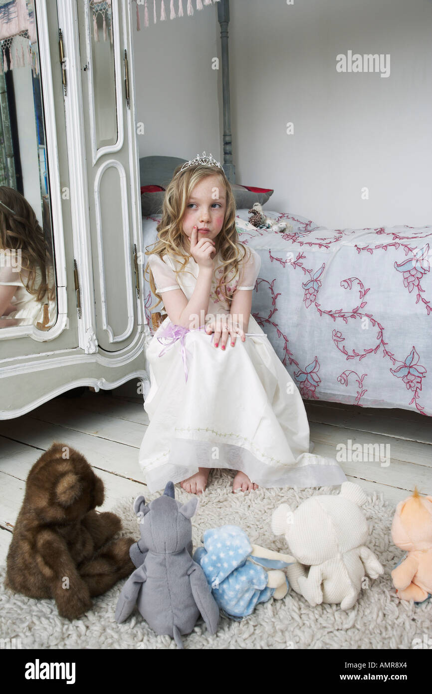 Girl Playing with Toys in Bedroom Stock Photo - Alamy