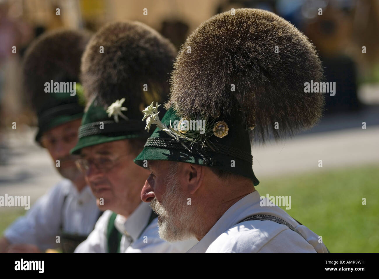 men wearing hat tuft of hair traditionally worn as a decoration Stock ...