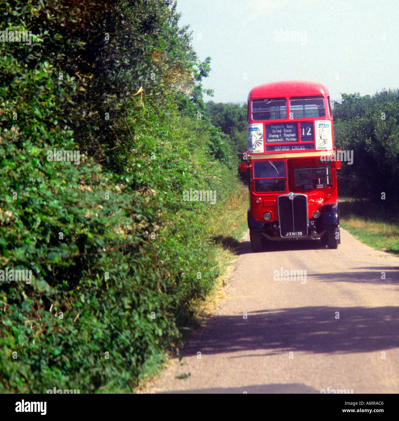Old red London bus in country lane Dorset England Stock Photo - Alamy