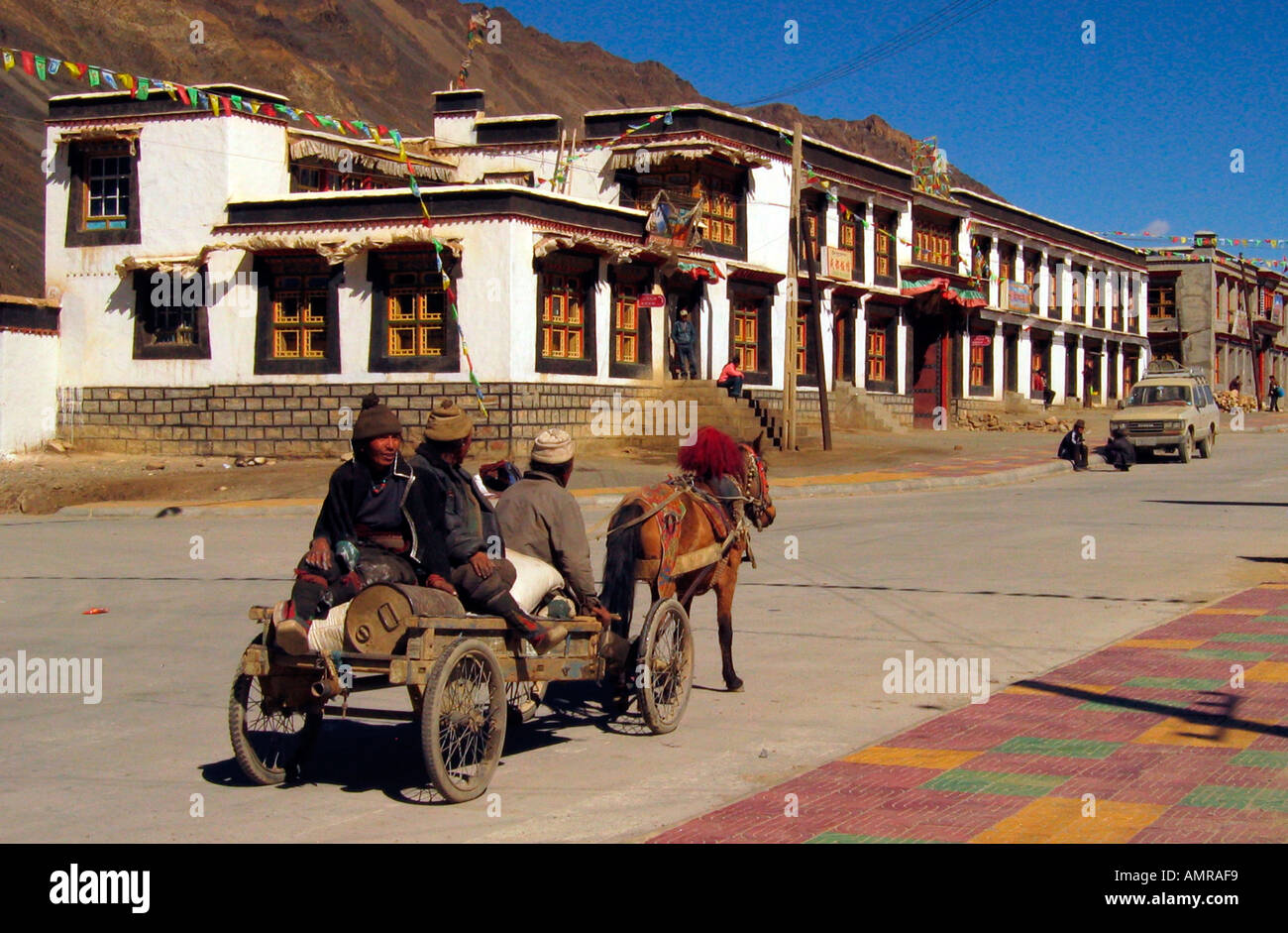 Horse and cart on main street Tingri last town on route south to ...