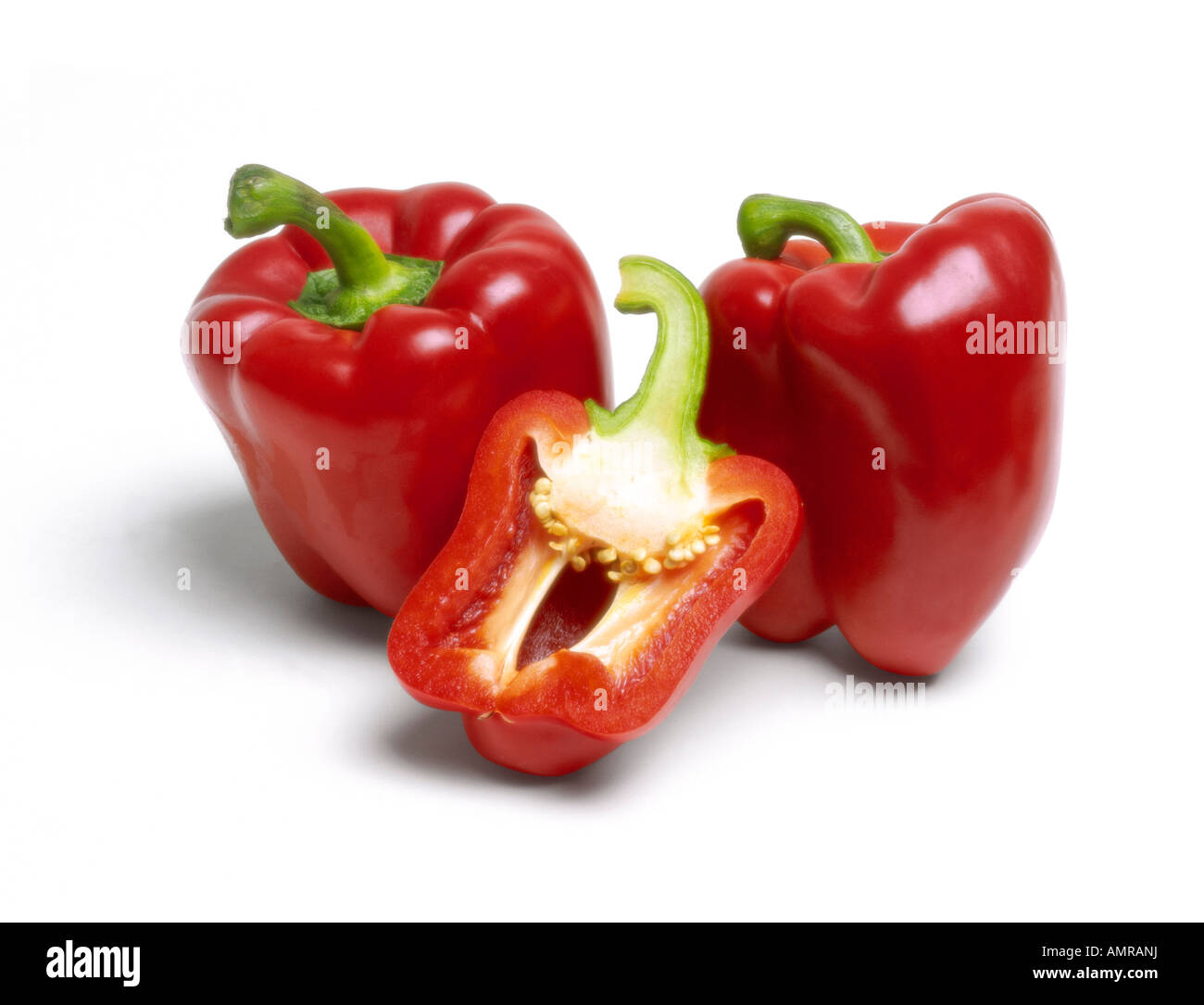 Three Red Bell Peppers Stock Photo - Alamy