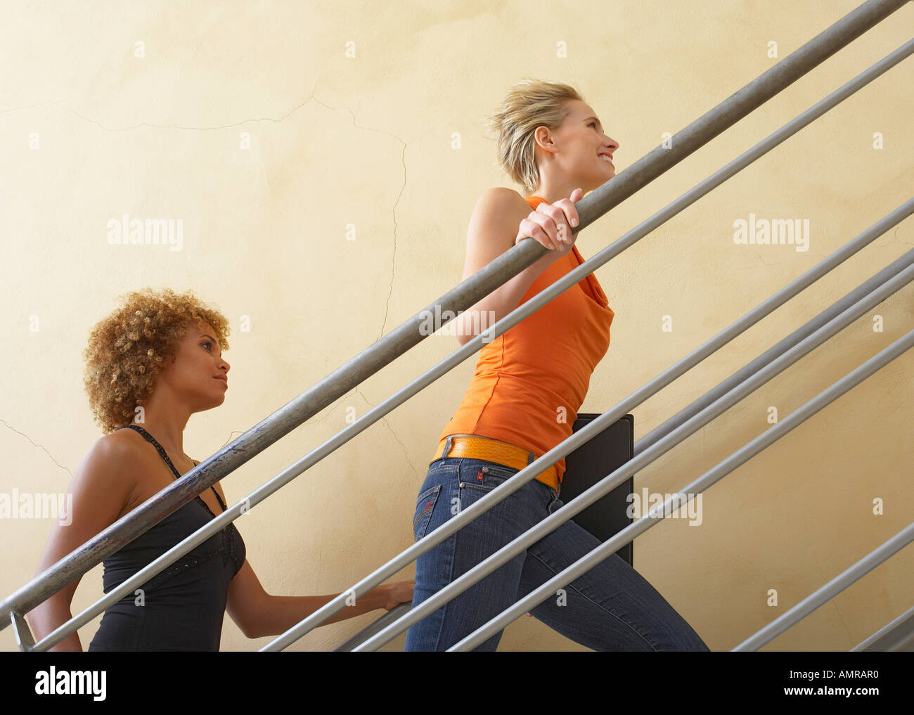 Woman Walking Up The Stairs High Resolution Stock Photography and ...