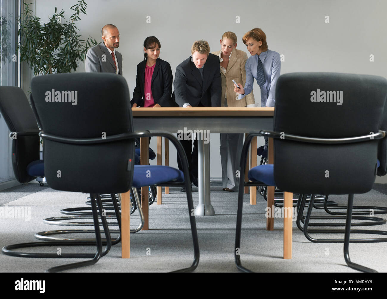 Woman Bending Over Table High Resolution Stock Photography and Images ...