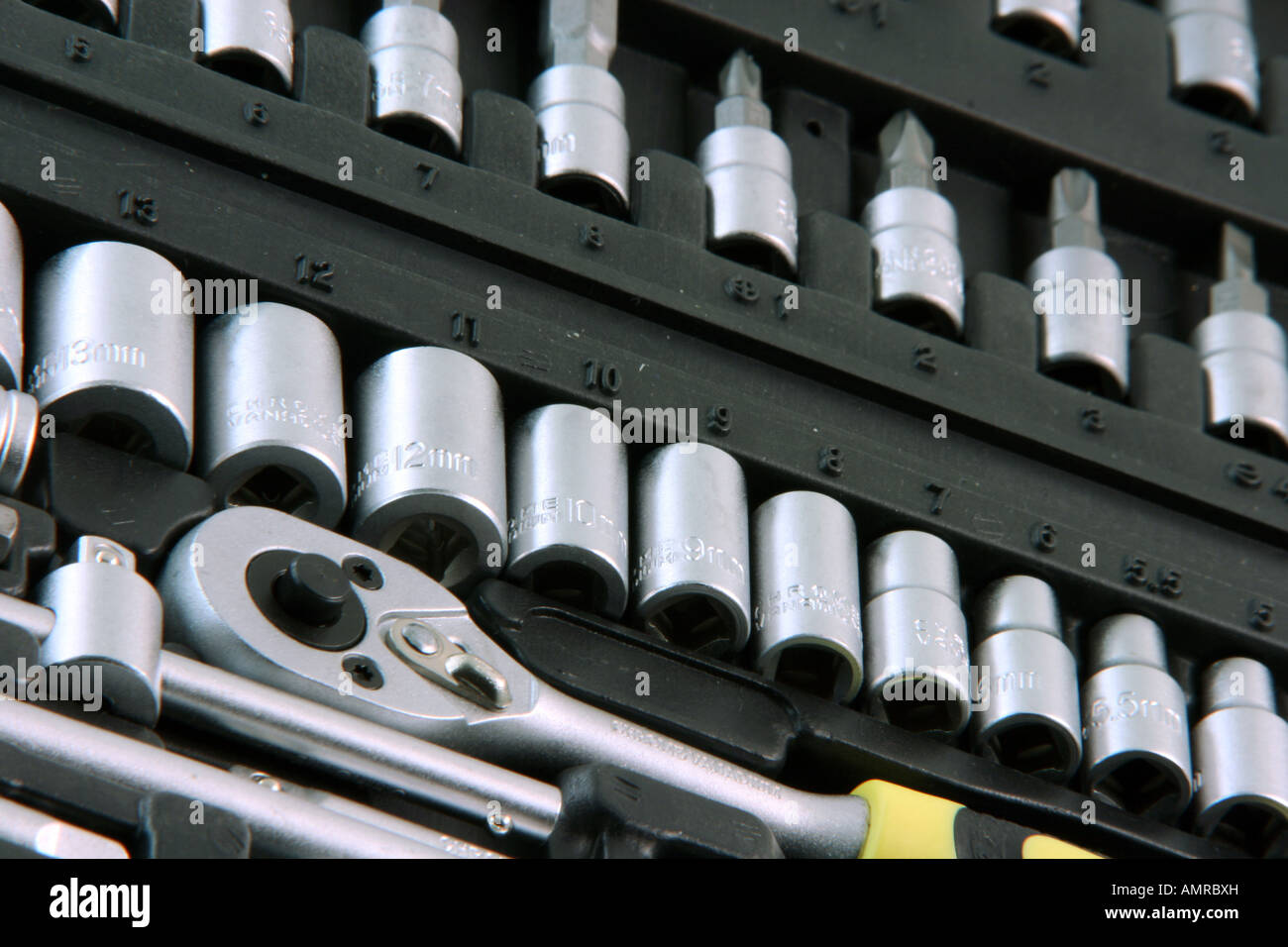 detail from black case of tools set with variate of bit sockets ...