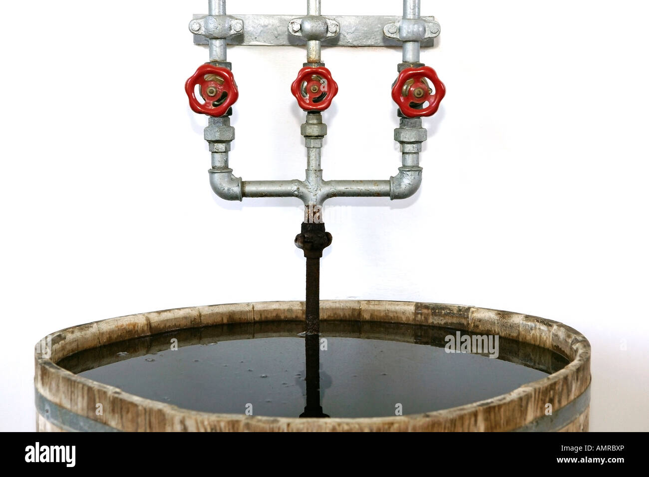 Fluid in the wooden vat Stock Photo - Alamy