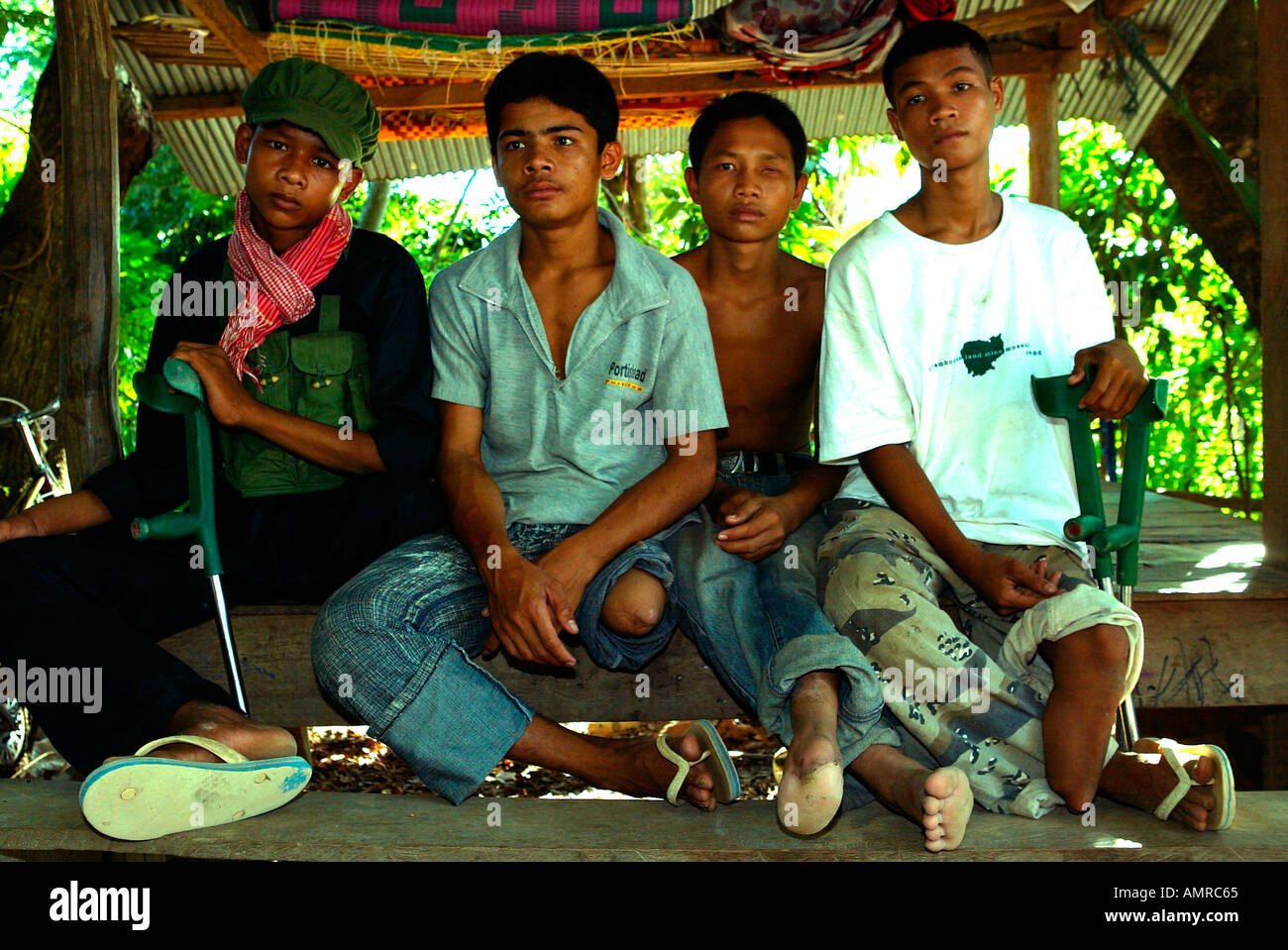 Four young men with landmine leg injuries rehabilitation centre in Siem ...