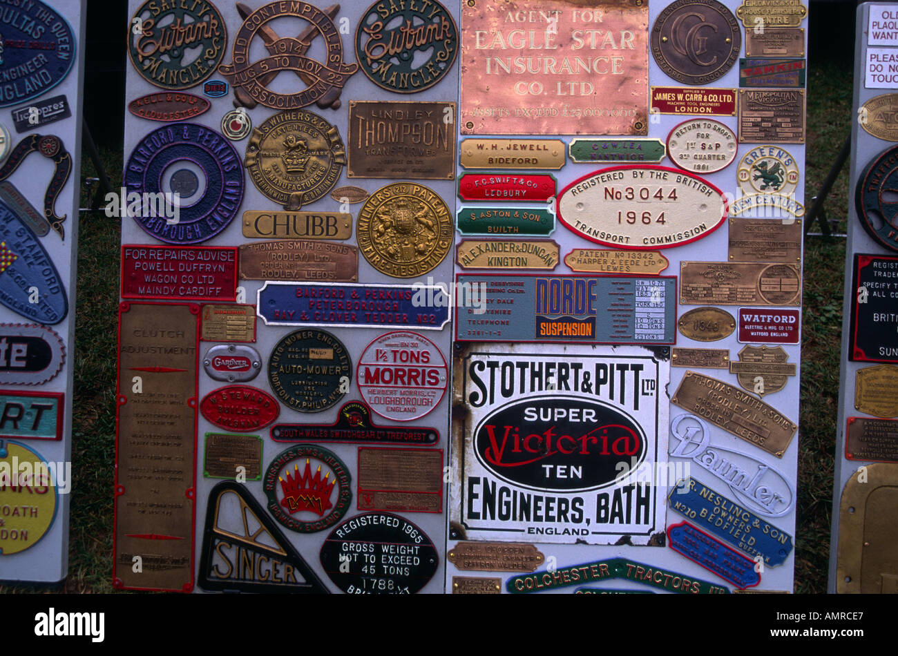 Display of old metal engineering signs Stock Photo - Alamy