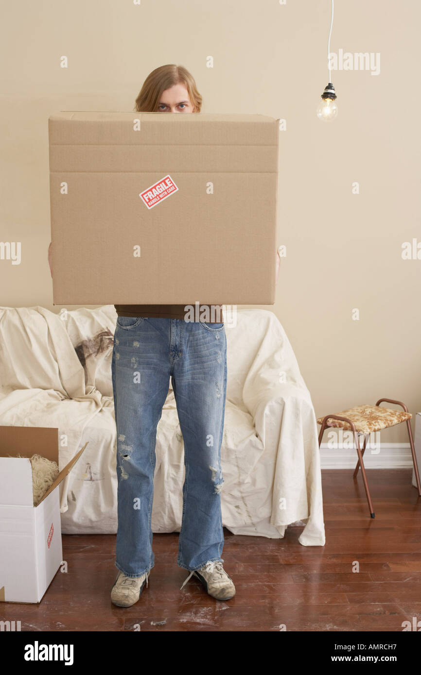 Man Lifting Heavy Box High Resolution Stock Photography and Images - Alamy