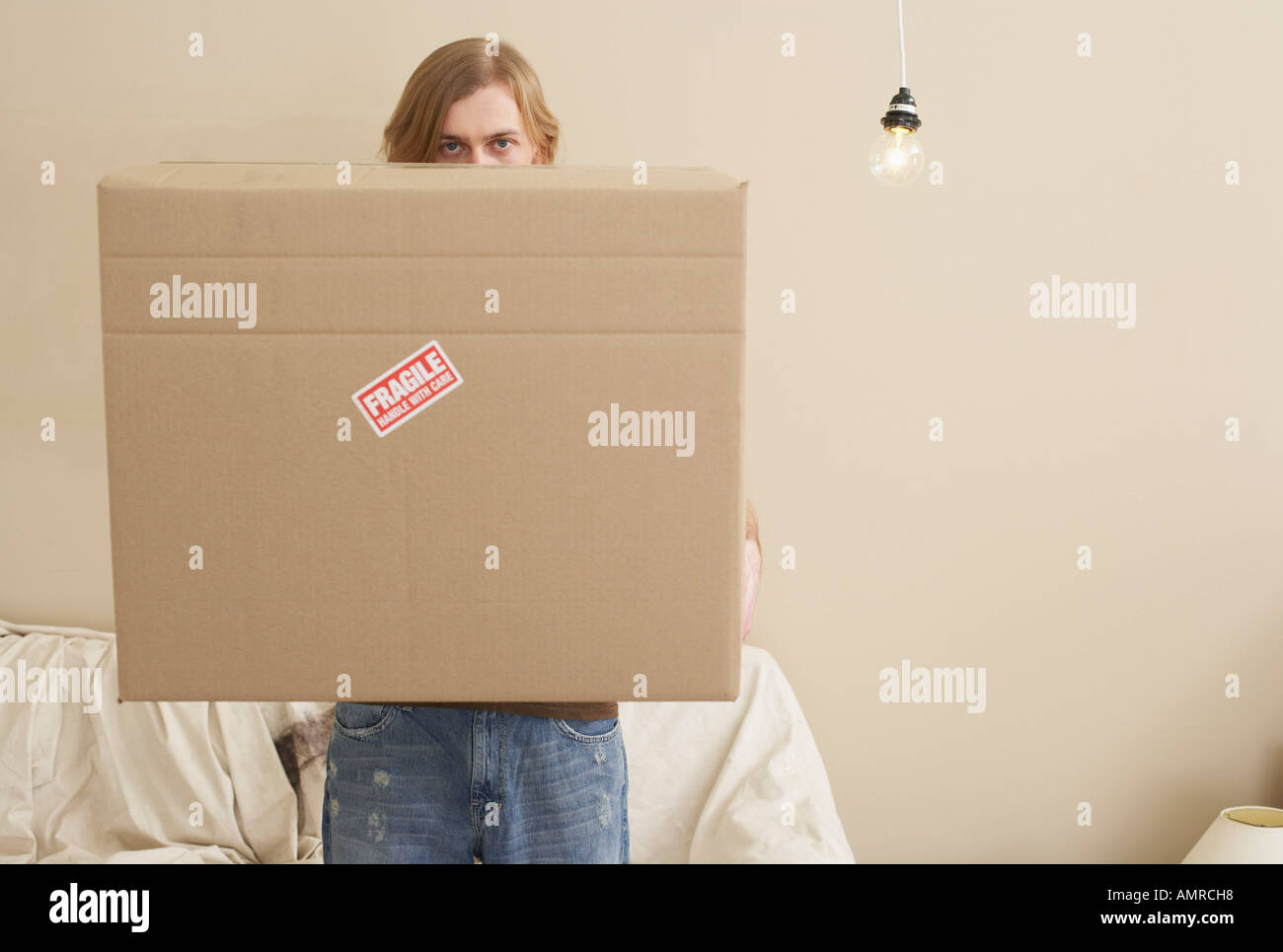 Man Lifting Heavy Box High Resolution Stock Photography and Images - Alamy