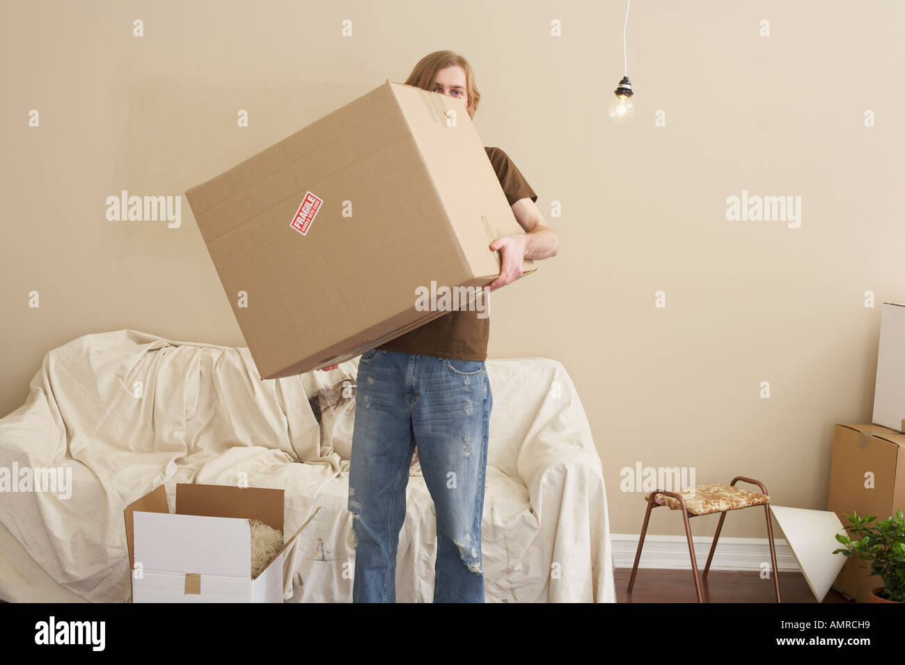 Man Lifting Heavy Box High Resolution Stock Photography and Images - Alamy