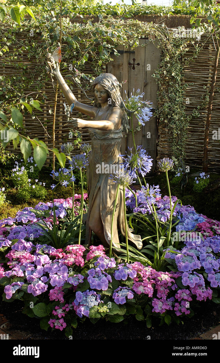 'Titania Queen of Faeries' holding two fairies Stock Photo - Alamy