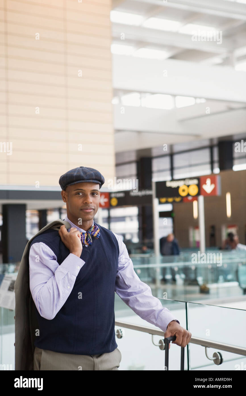 African man holding jacket over shoulder Stock Photo - Alamy African man holding jacket over shoulder Stock Photo - Alamy