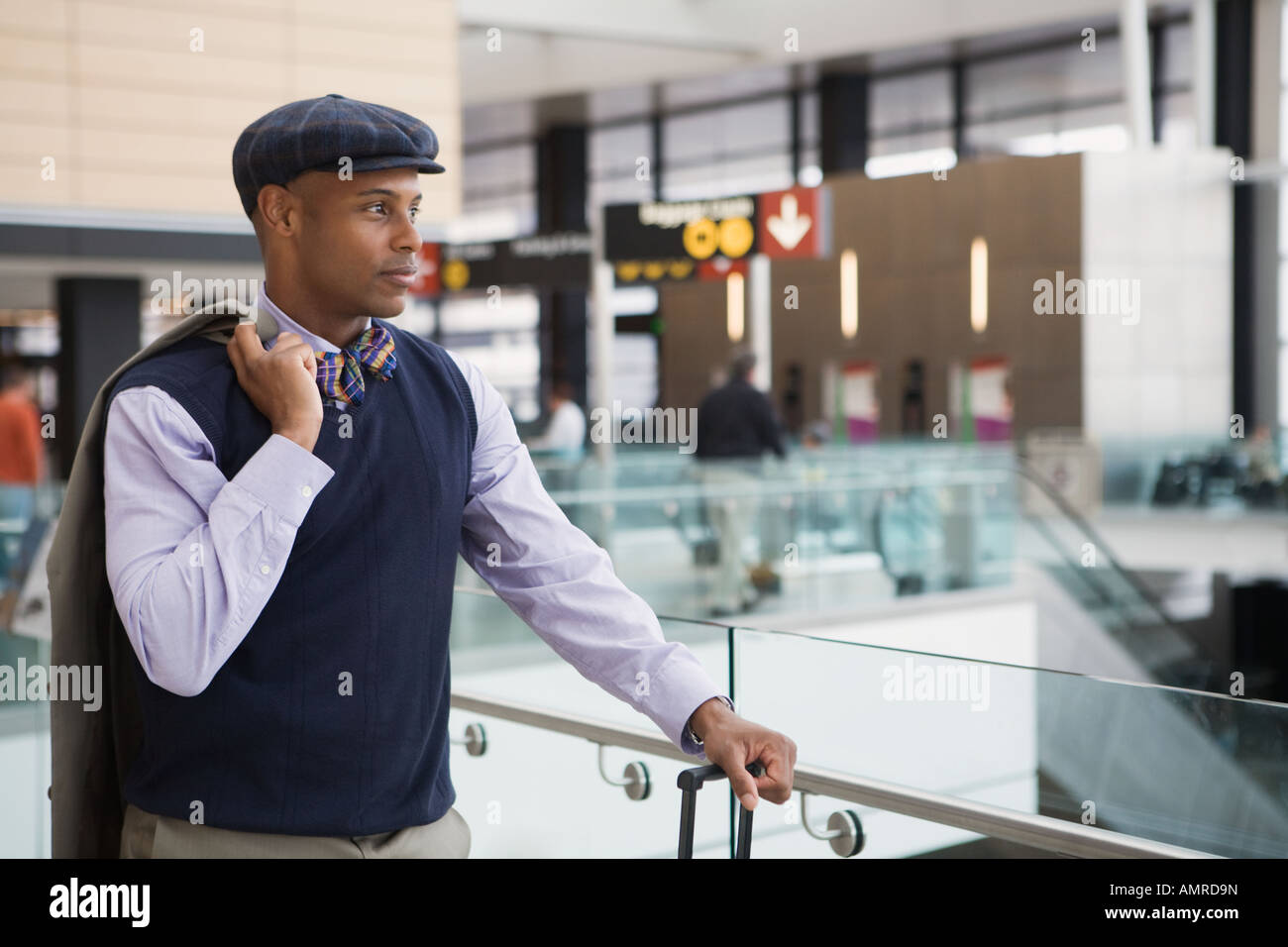 African man holding jacket over shoulder Stock Photo - Alamy African man holding jacket over shoulder Stock Photo - Alamy