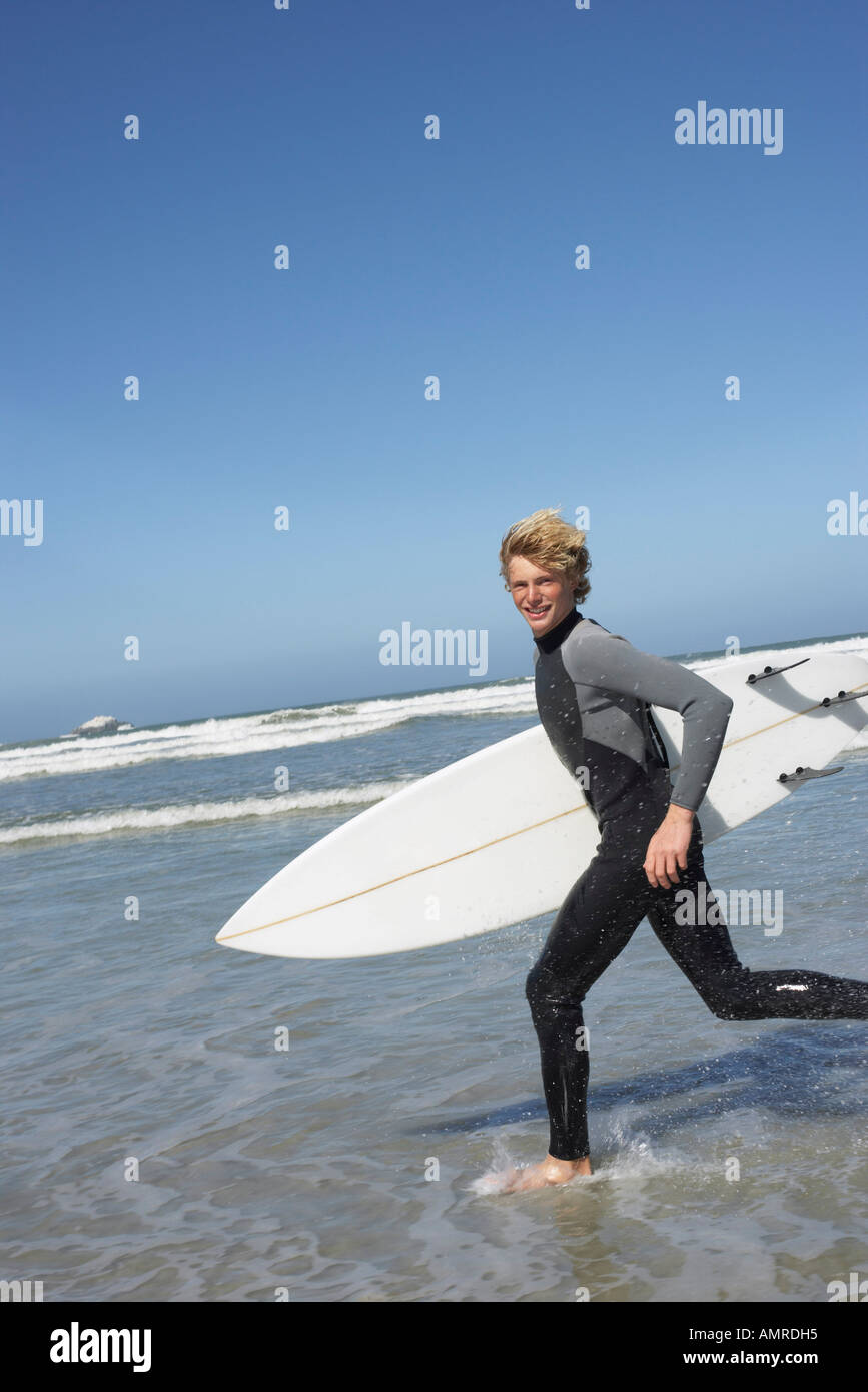 Running Carrying Surf Board Surfboard High Resolution Stock Photography ...