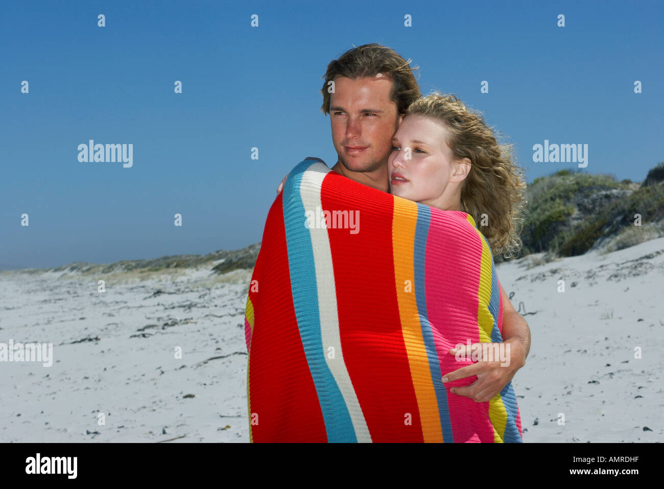 Cuddle beach towel hi-res stock photography and images - Alamy