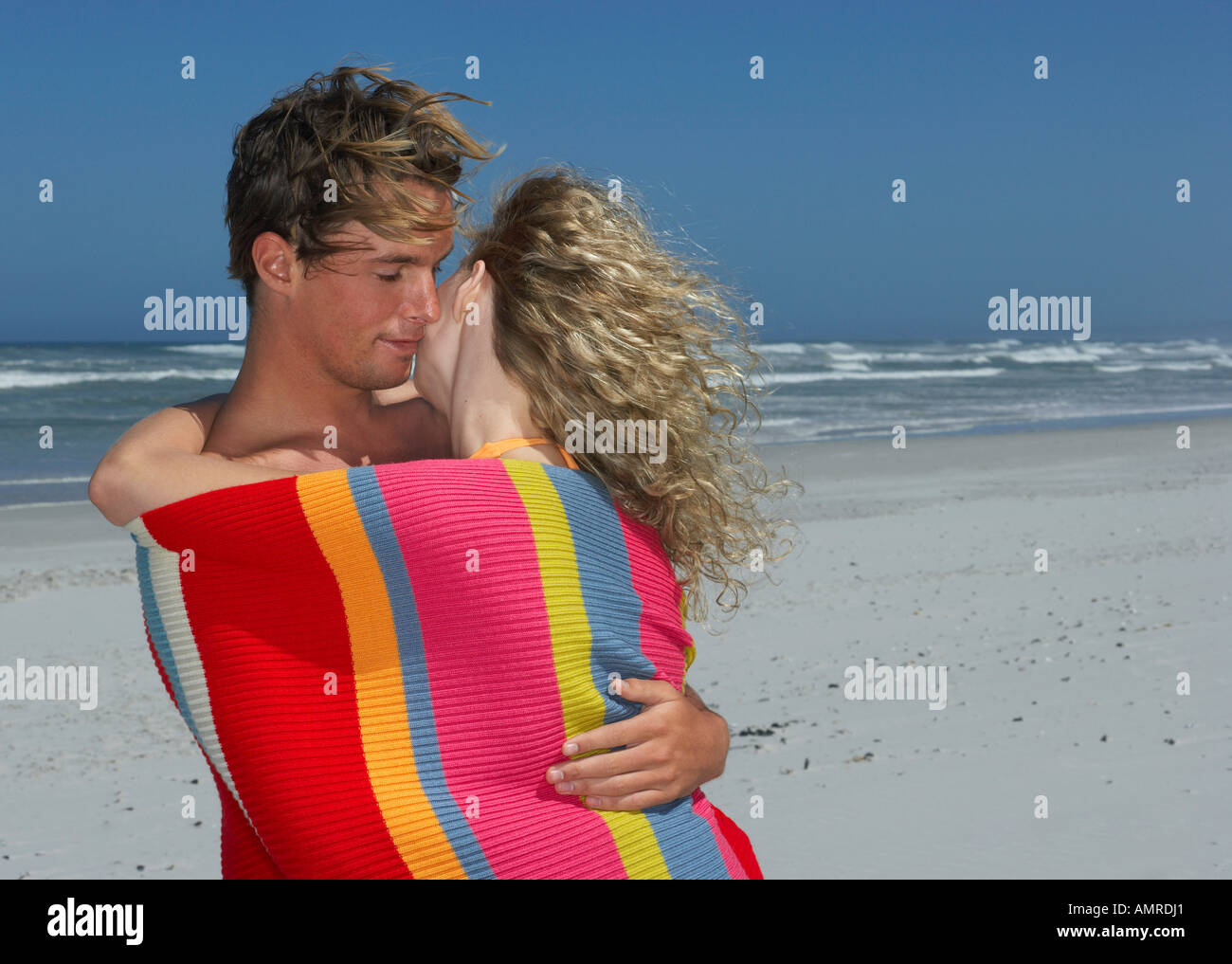 Cuddle beach towel hi-res stock photography and images - Alamy