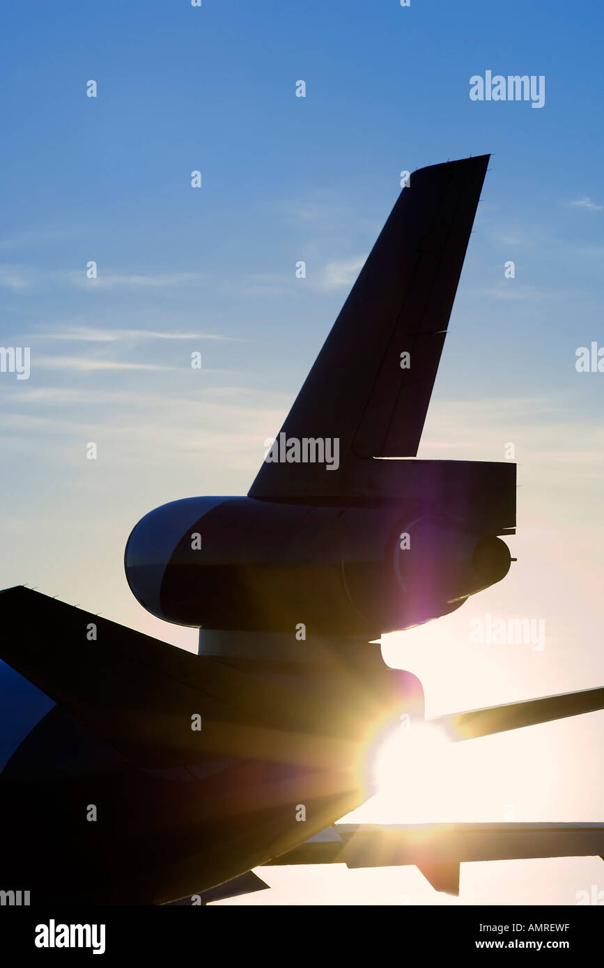 Airplane at Dusk Stock Photo - Alamy