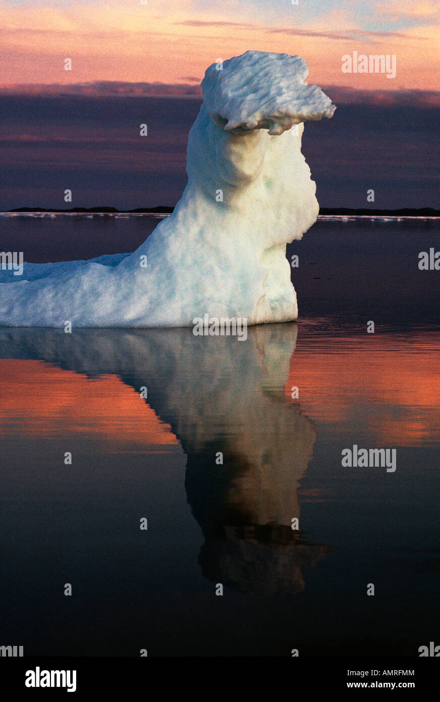 Unusual sea ice formations iceburg at sunset in Cumberland Sound near ...