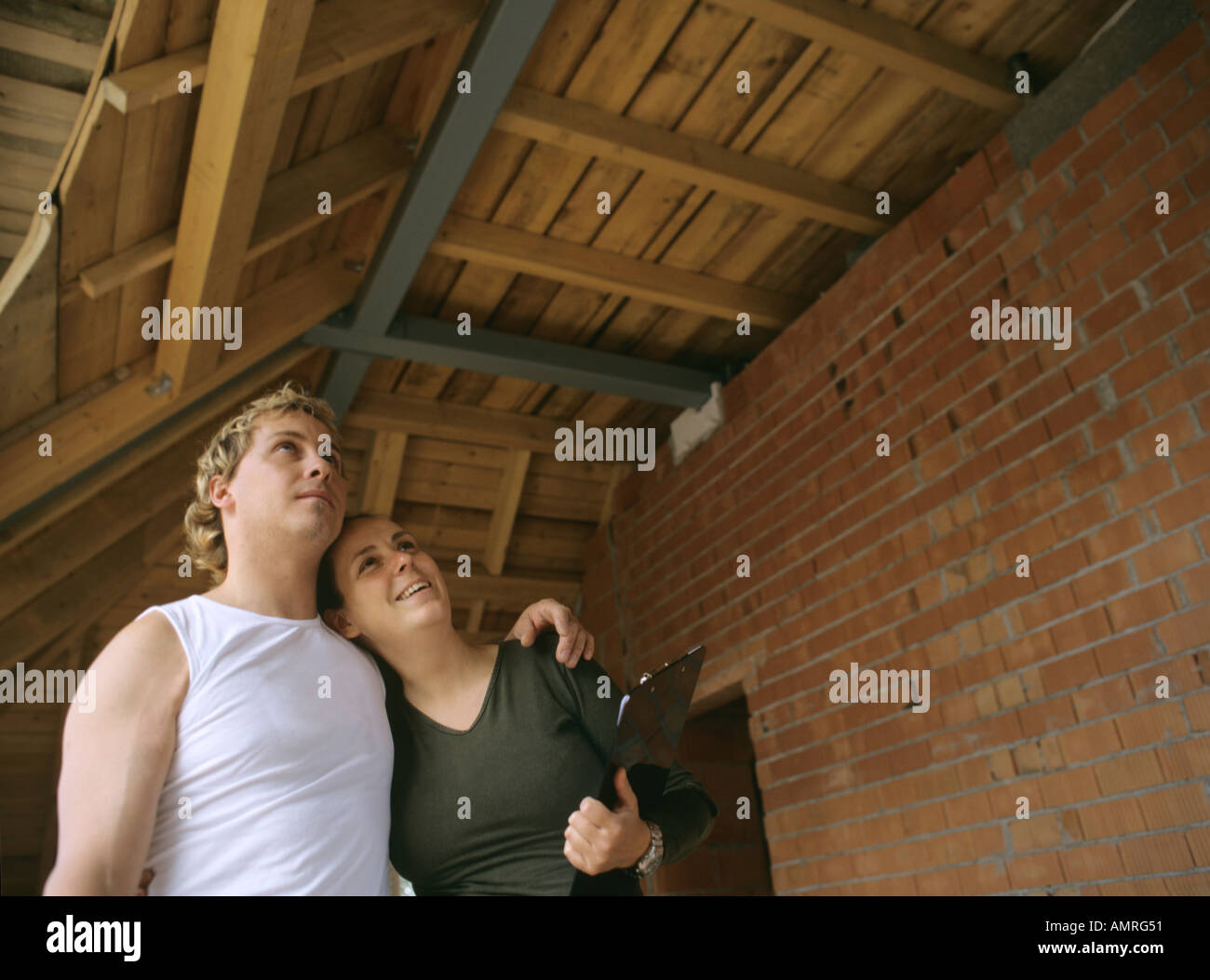 Young couple visiting their future home Stock Photo - Alamy