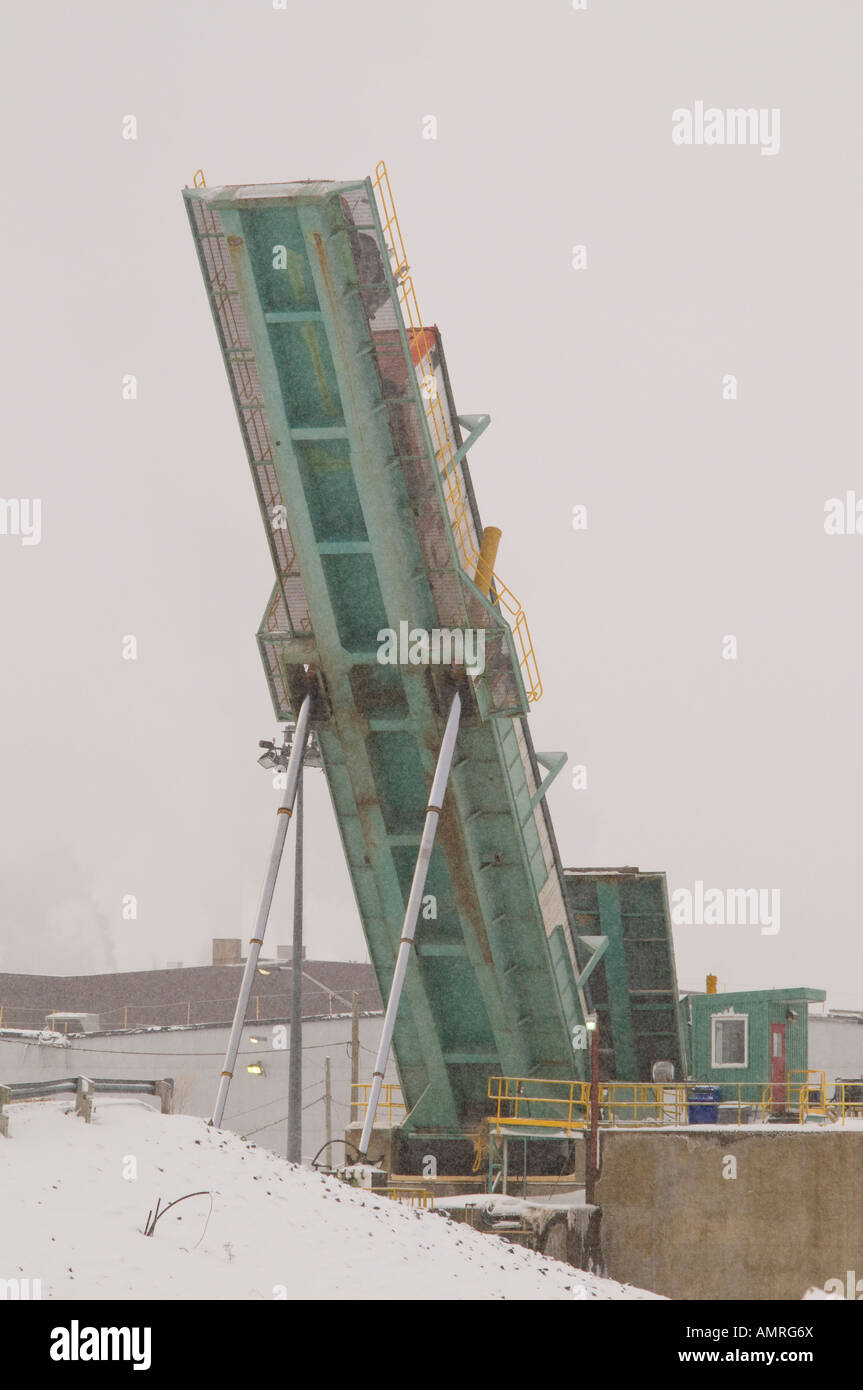 Transport truck loaded with wood chips being unloaded at the Abitibi ...