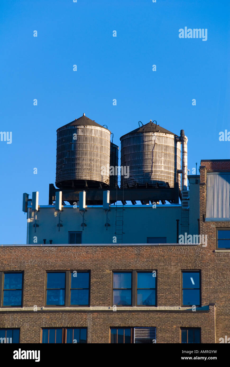 Water Storage Tanks on a New York Building Stock Photo - Alamy