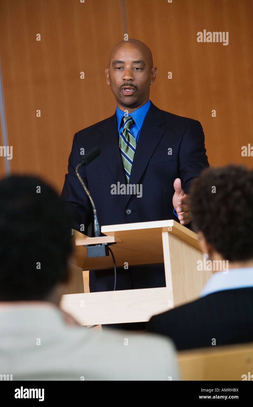 African businessman giving lecture Stock Photo - Alamy