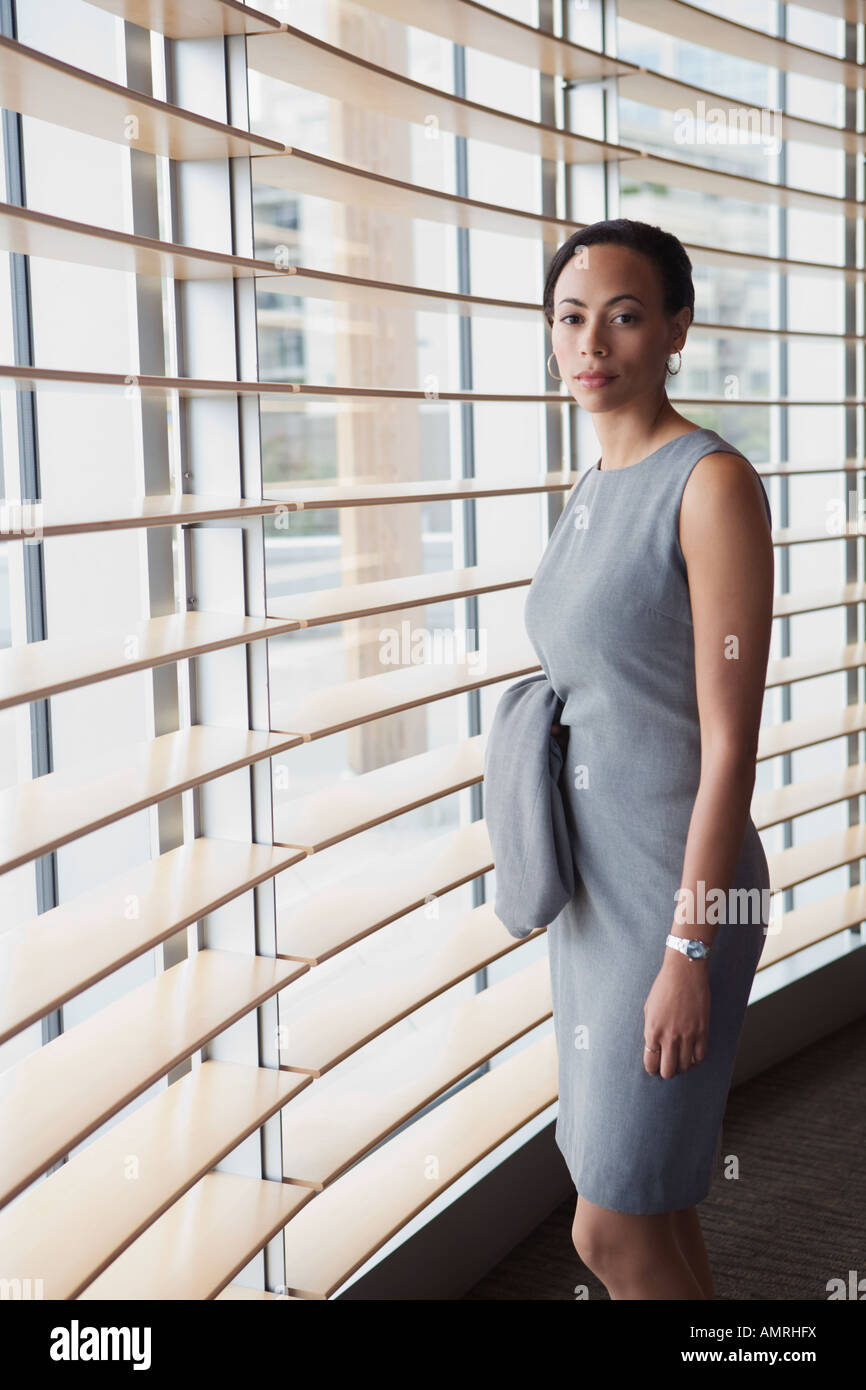African woman next to window Stock Photo - Alamy