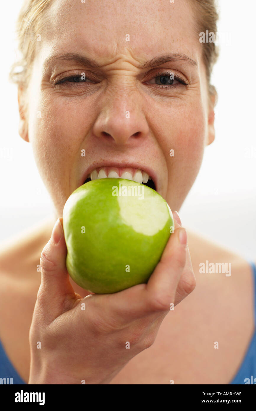 Woman eating inside dressed up hi-res stock photography and images - Alamy