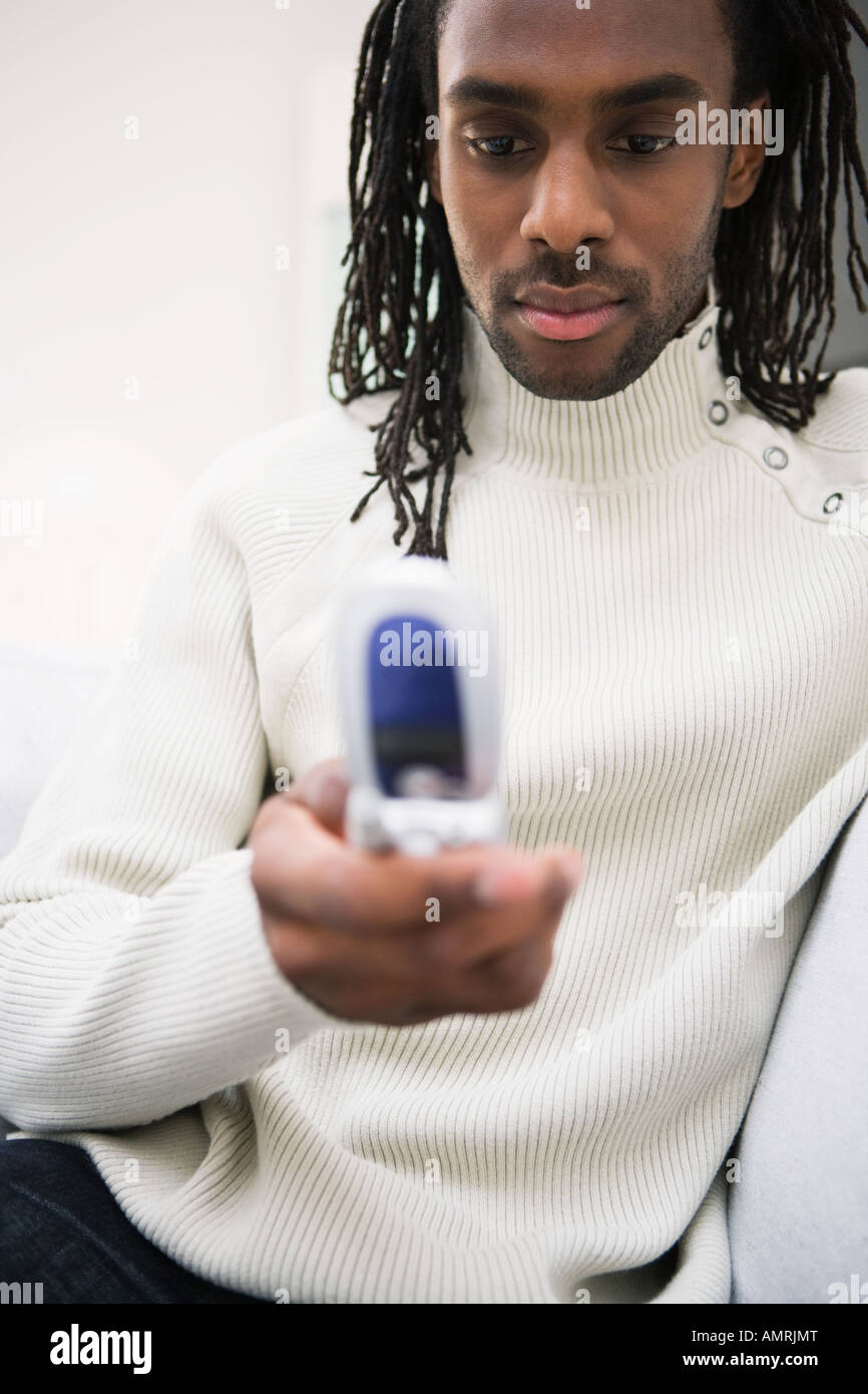 Man looking down inside his sweater hi-res stock photography and images ...
