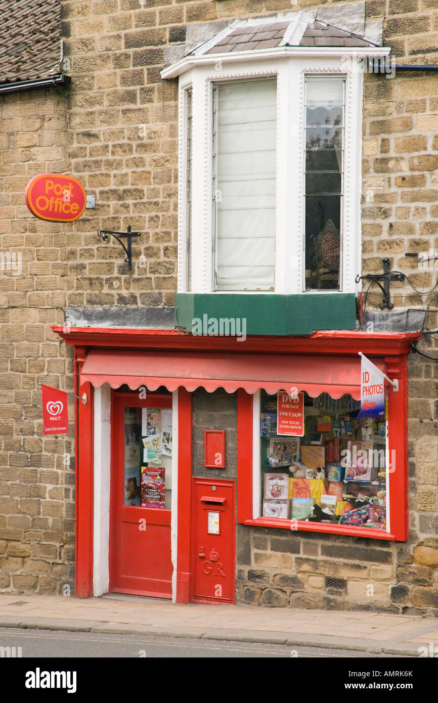 Old Post Office with red Georgian mail box and small local shop in old ...