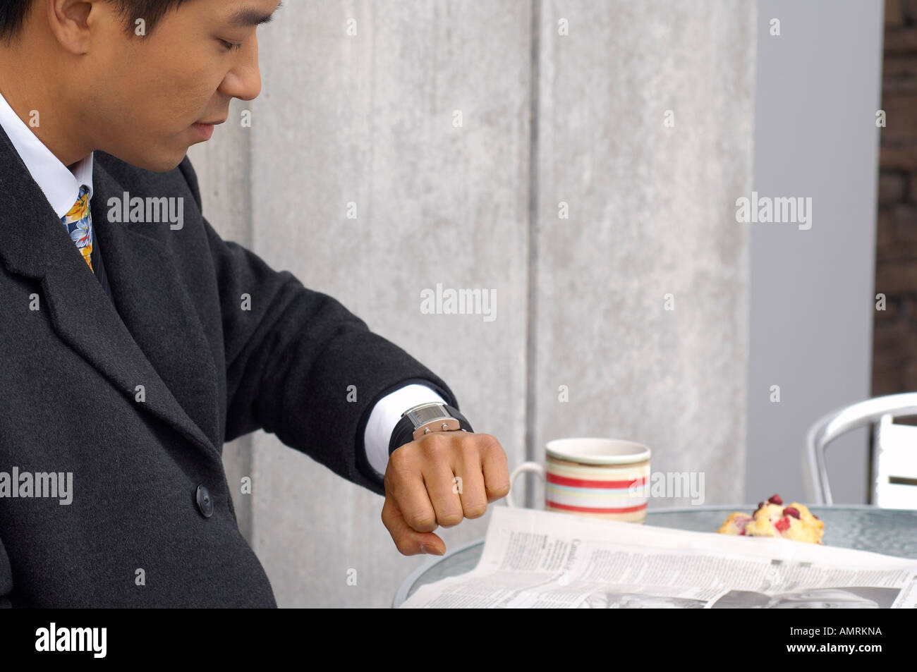 Checking watch outside restaurant hi-res stock photography and images ...