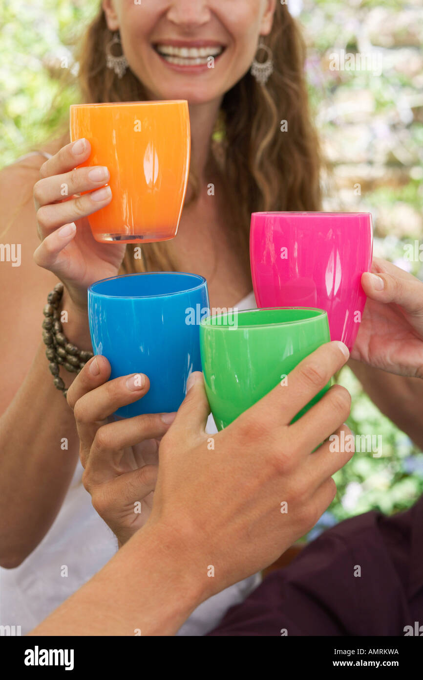 Brunette woman raising toast glass hi-res stock photography and images ...
