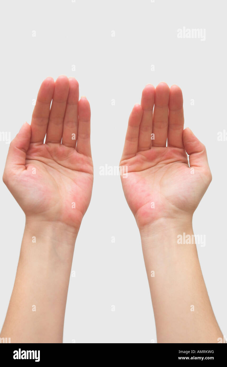 Woman holding out cupped hands close up Stock Photo - Alamy